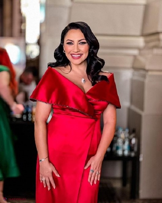 Andra, apariție de divă la un eveniment caritabil, într-o rochie roșie ...